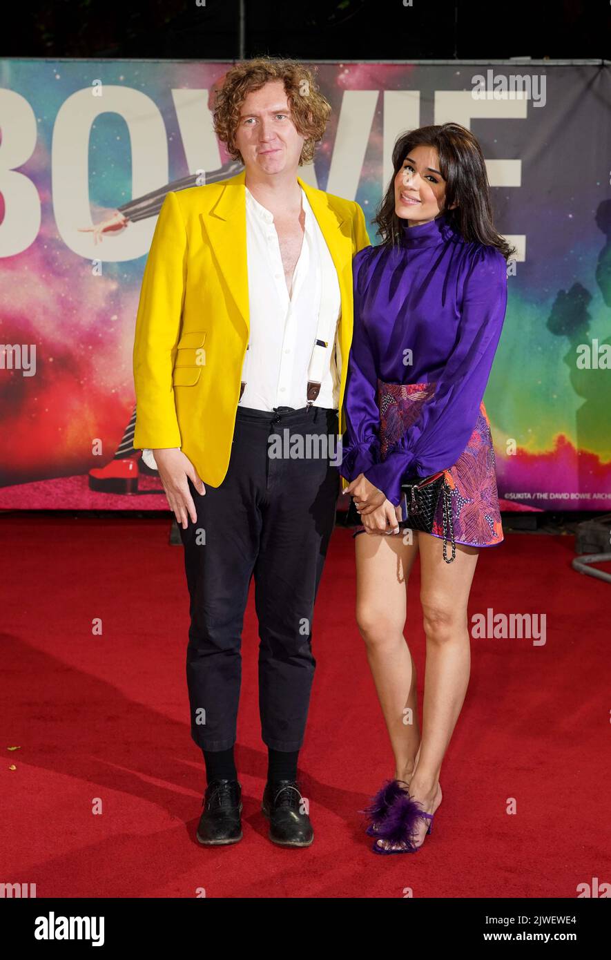 Hugh Harris and guest arriving for the London premiere of Moonage ...