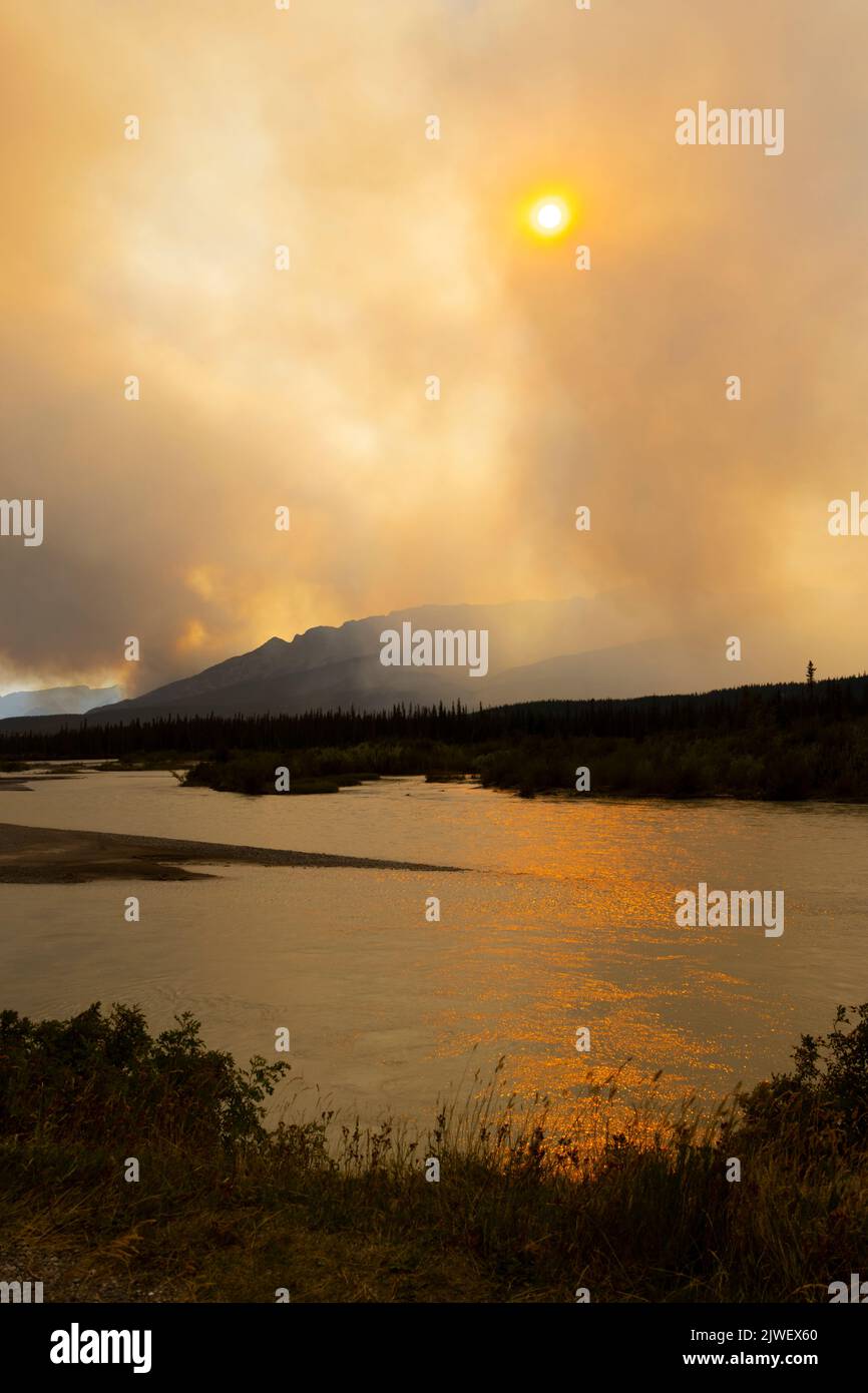 smoke clouded sunset during forest fire Stock Photo - Alamy