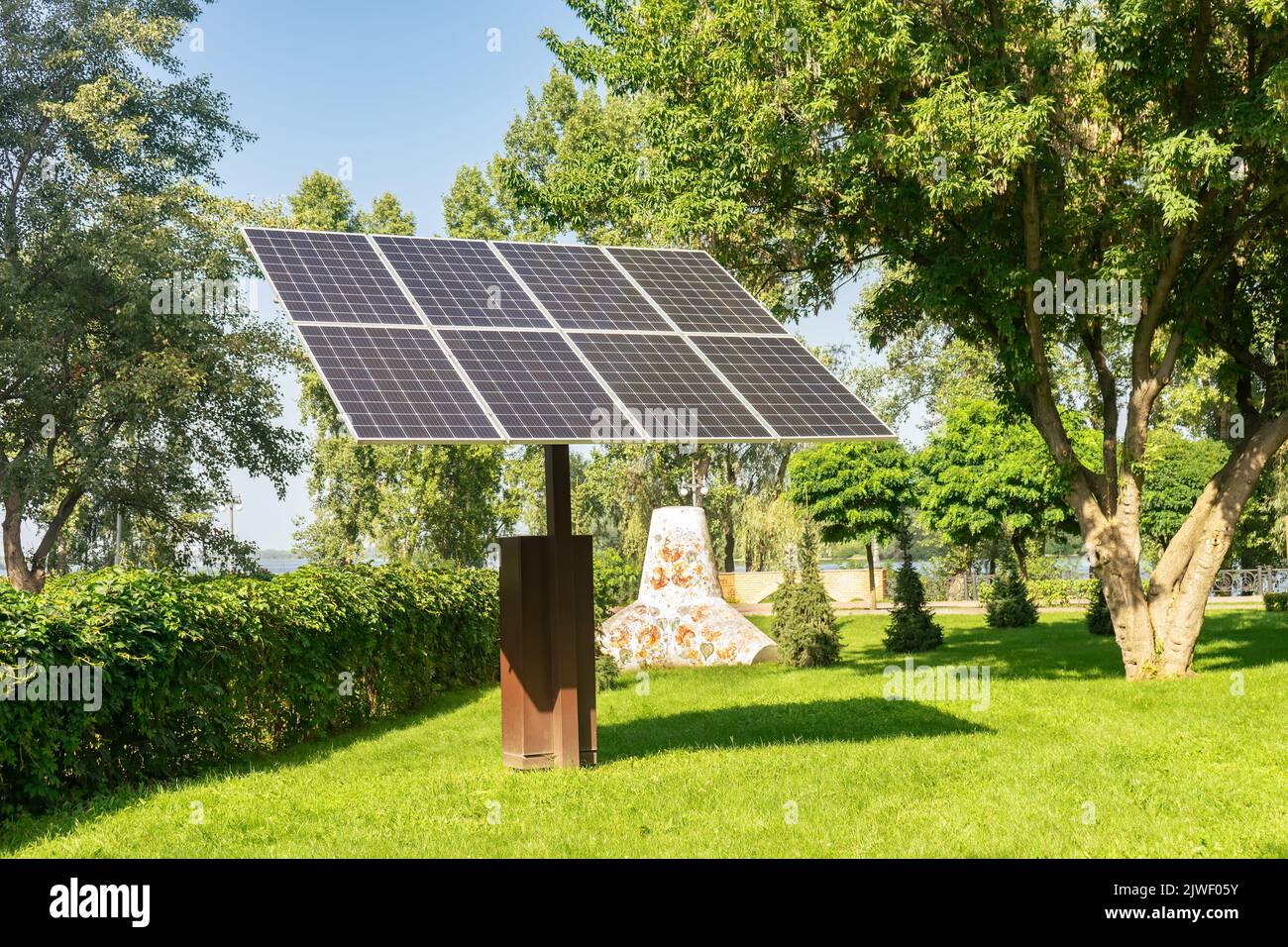 Solar panels in public park backgound. Photovoltaic modules for ...