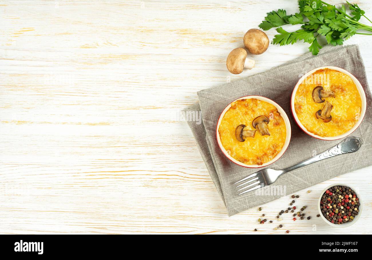 Chicken and mushroom casserole with golden crust, julienne with baked ...