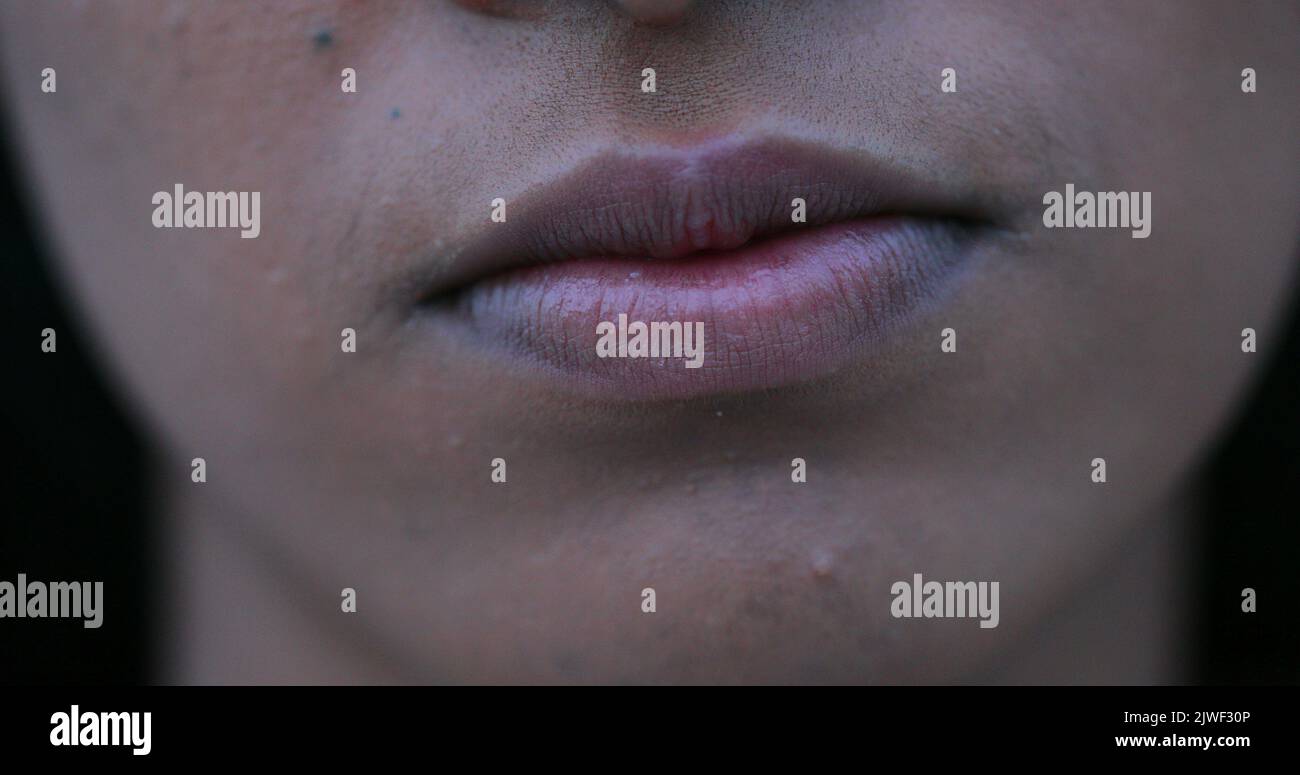 Close up of black american african woman lips and mouth, feeling ...
