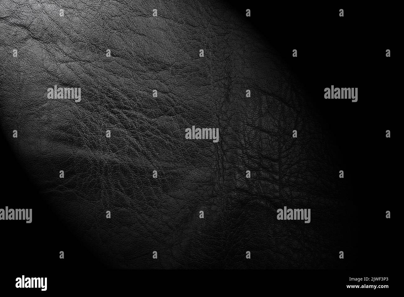 Black leather texture. Abstract background of dark leather with small ...