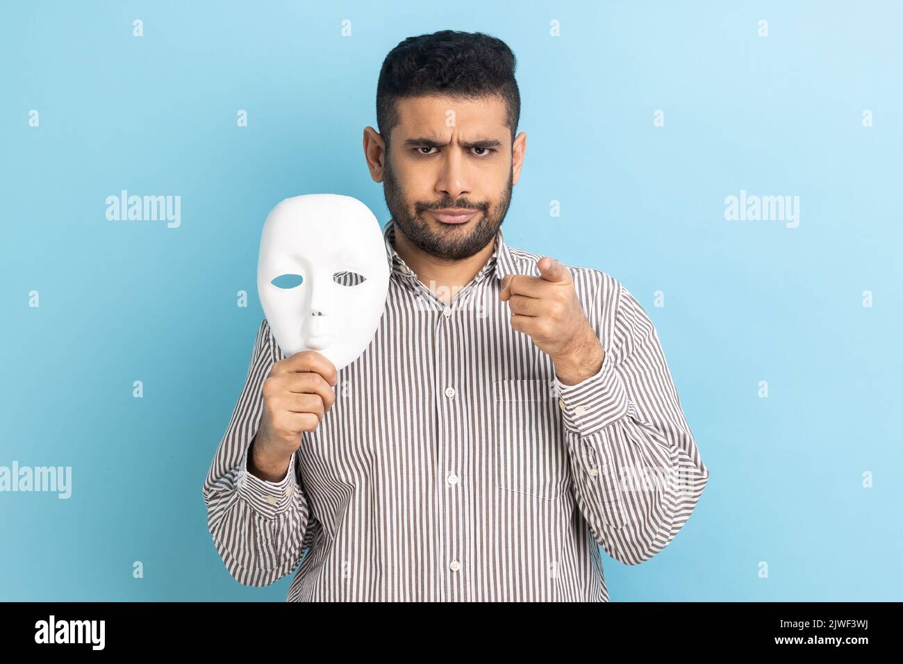 Portrait of strict bossy businessman pointing finger to camera and ...