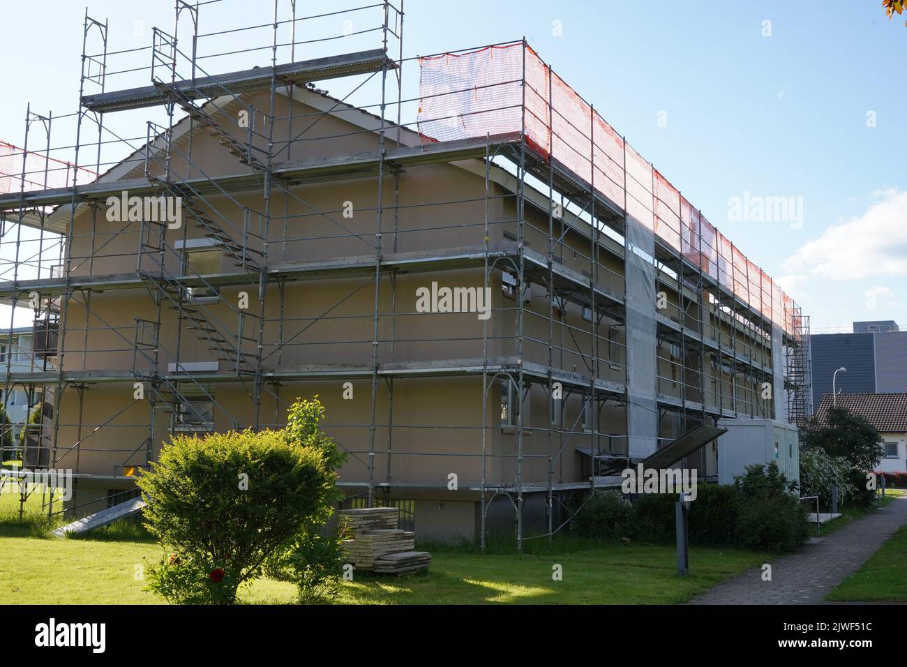 Front and side view on residential apartment house in Switzerland with ...