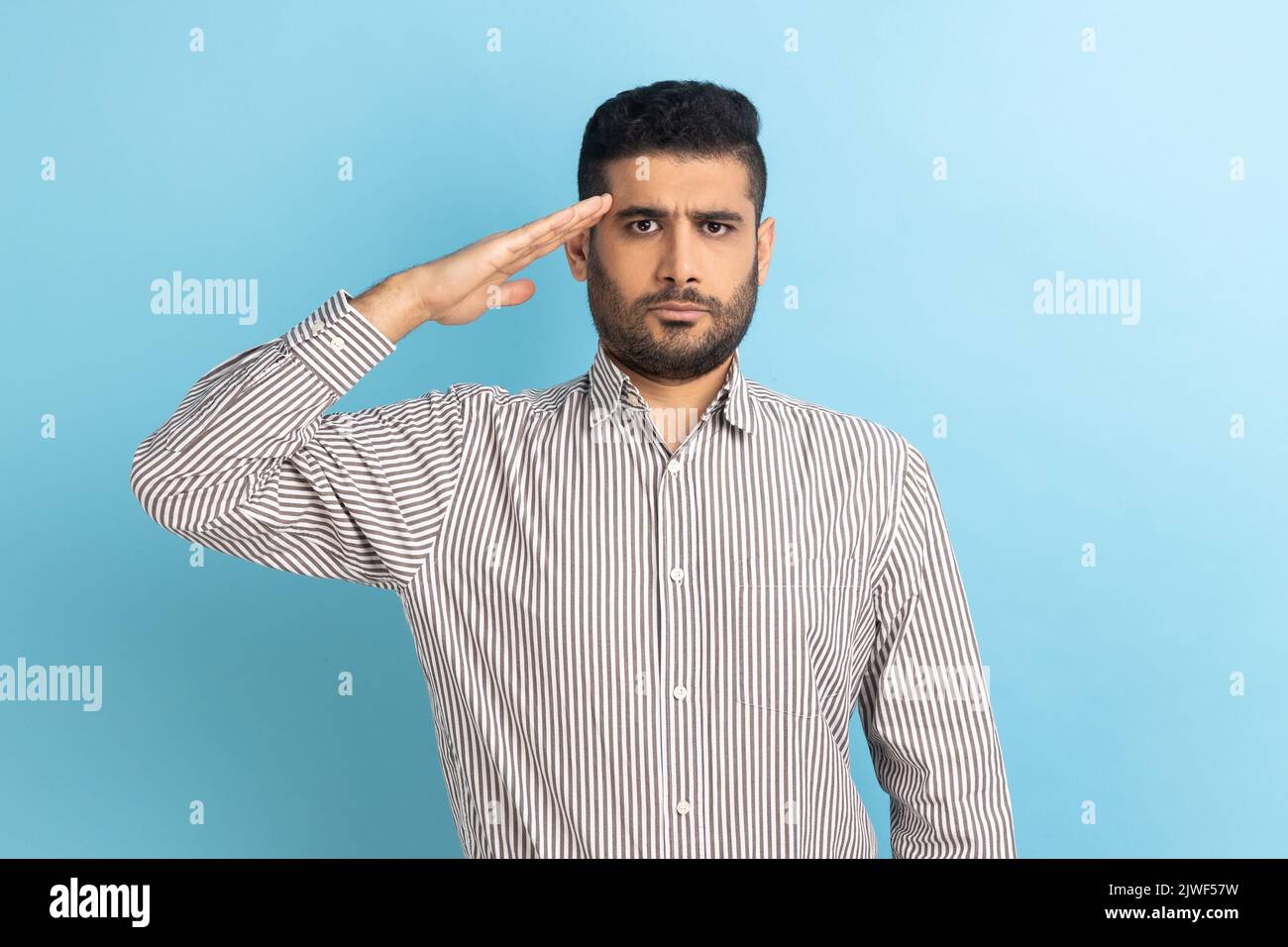 Yes sir. Responsible patriotic businessman saluting with respect as if ...