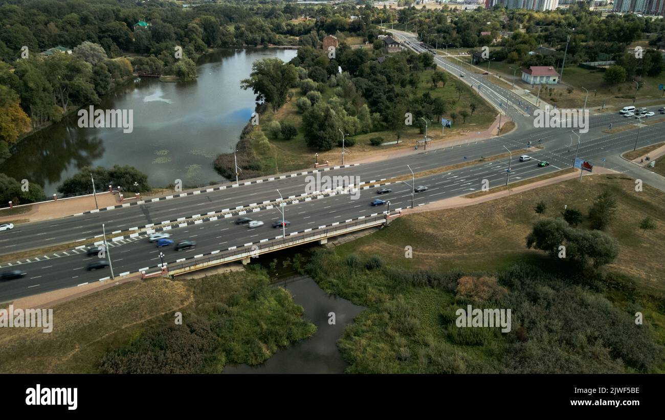 Multi-lane city highway. Overpass across the river. Aerial photography ...