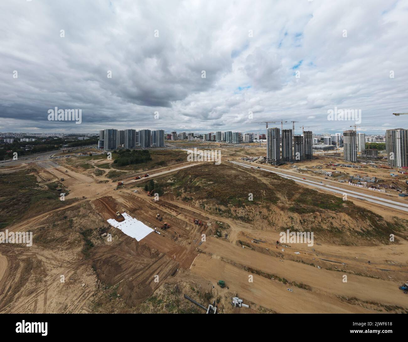 Construction site of a new city block. Construction of multi-storey ...