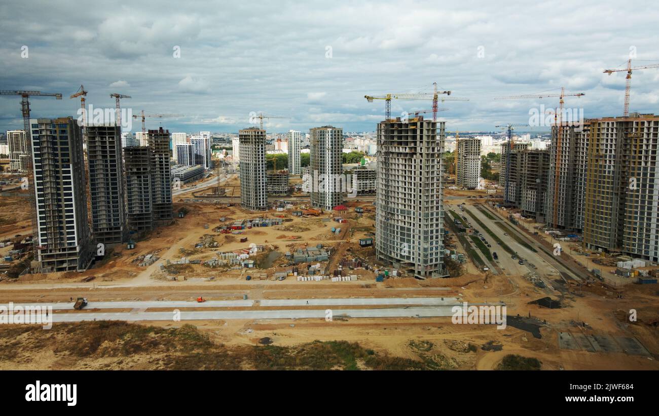 Construction site of a new city block. Construction of multi-storey ...