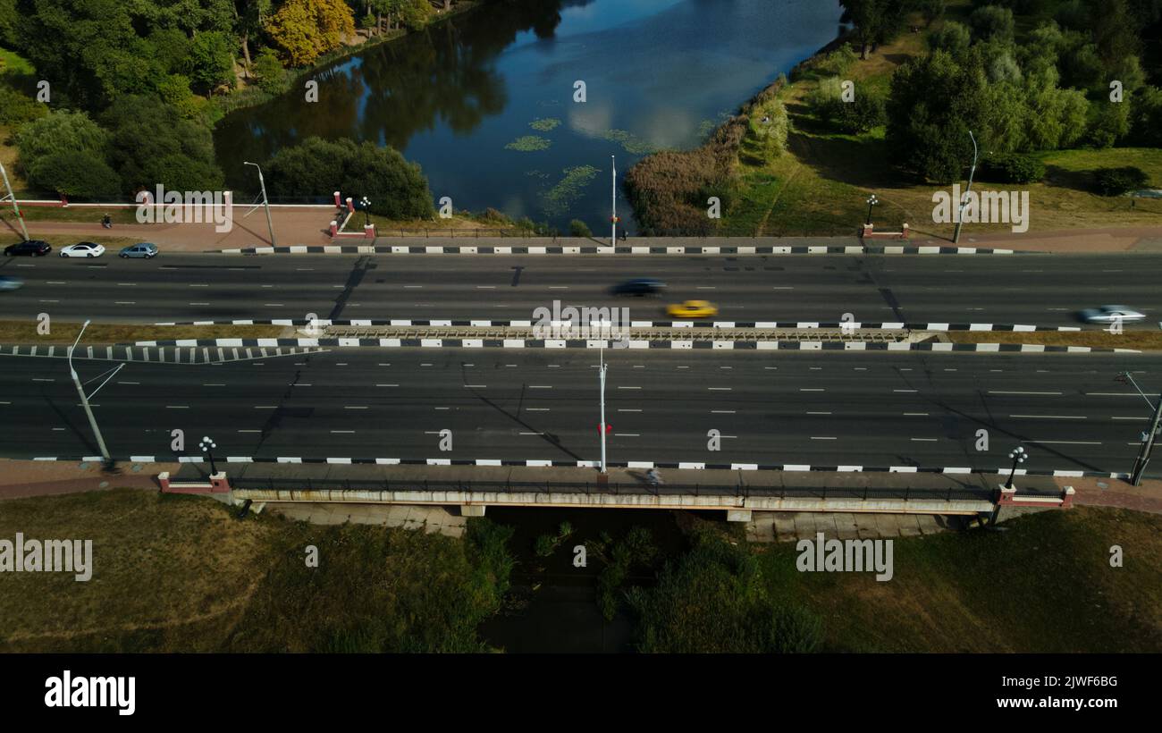Multi-lane city highway. Overpass across the river. Aerial photography ...
