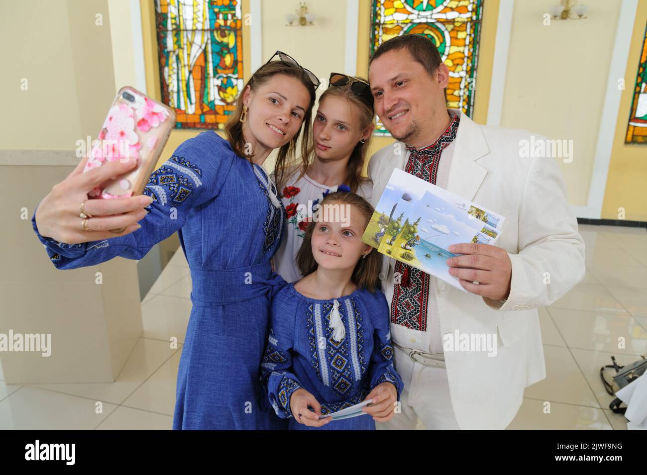 Lviv, Ukraine. 1st Sep, 2022. A family takes a selfie during ...