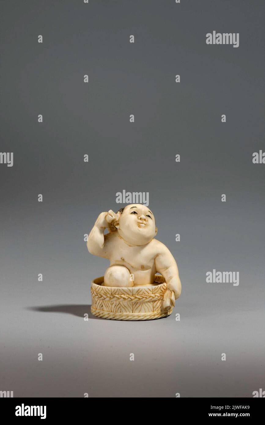 Netsuke in the shape of a boy bathing in a tub. unknown, sculptor Stock ...