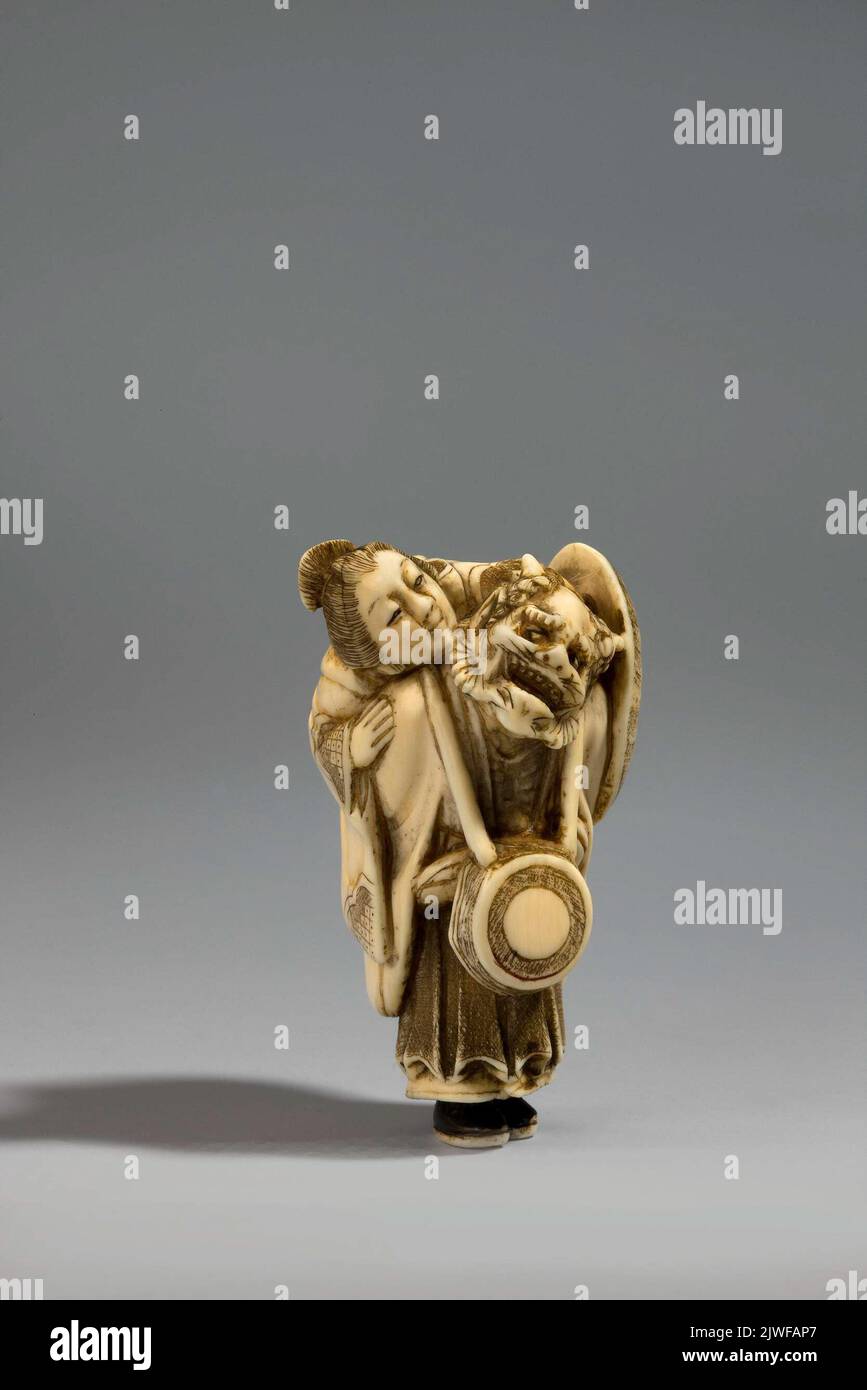 Netsuke in the form of a demon carrying the goddess Benten on his back ...