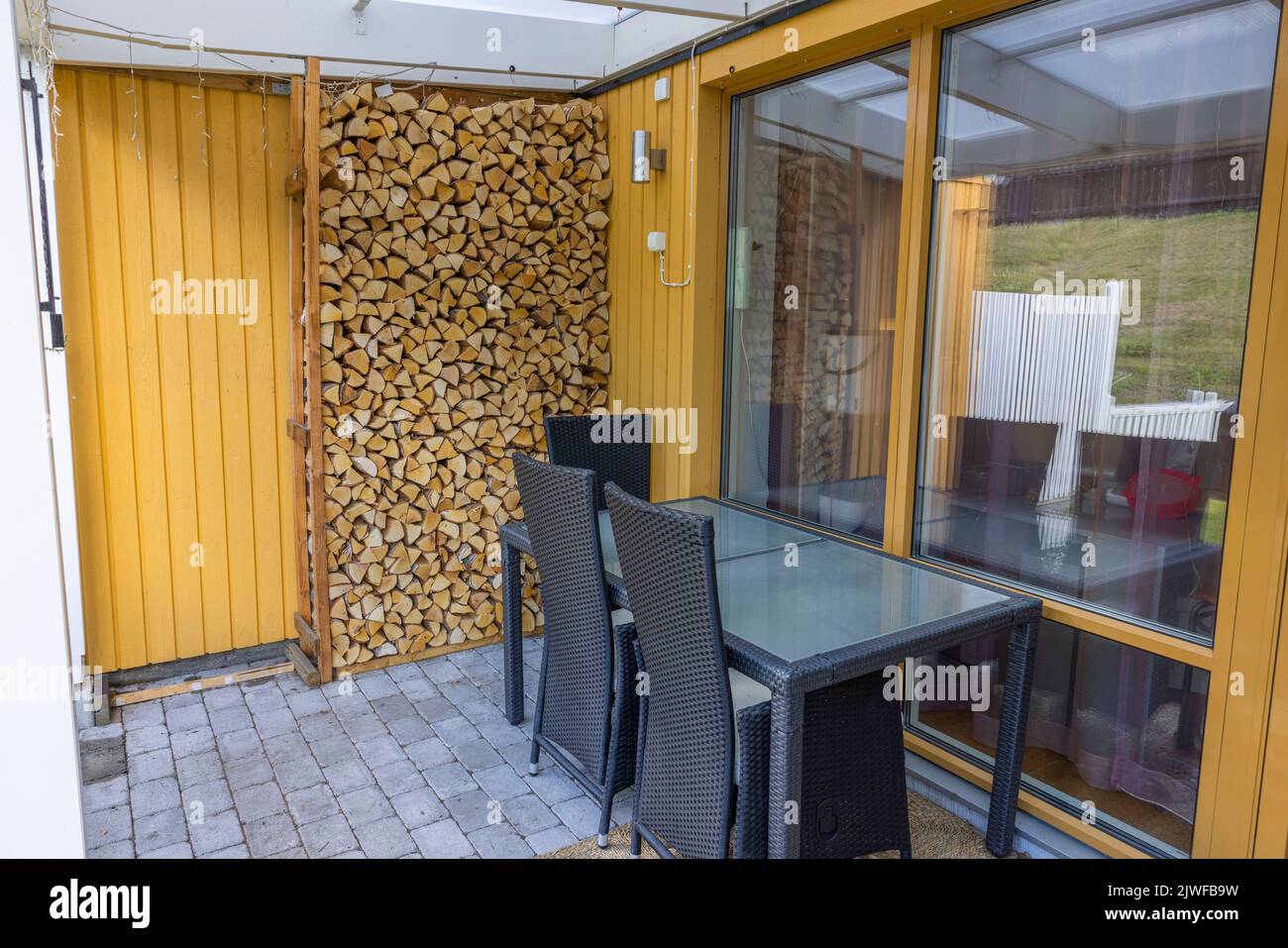Beautiful view of neatly folded stack of birch firewood on backyard ...