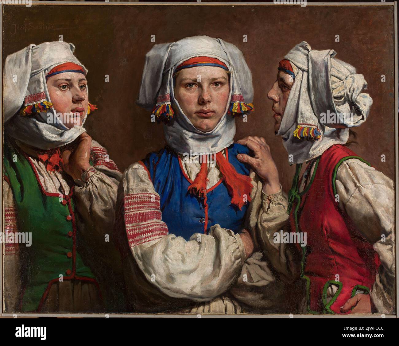 Three women in folk attires. Smoliński, Józef (1865-1927), painter Stock Photo - Alamy