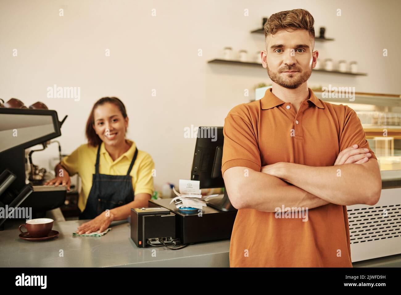 Business owner crossed arms hi-res stock photography and images - Alamy