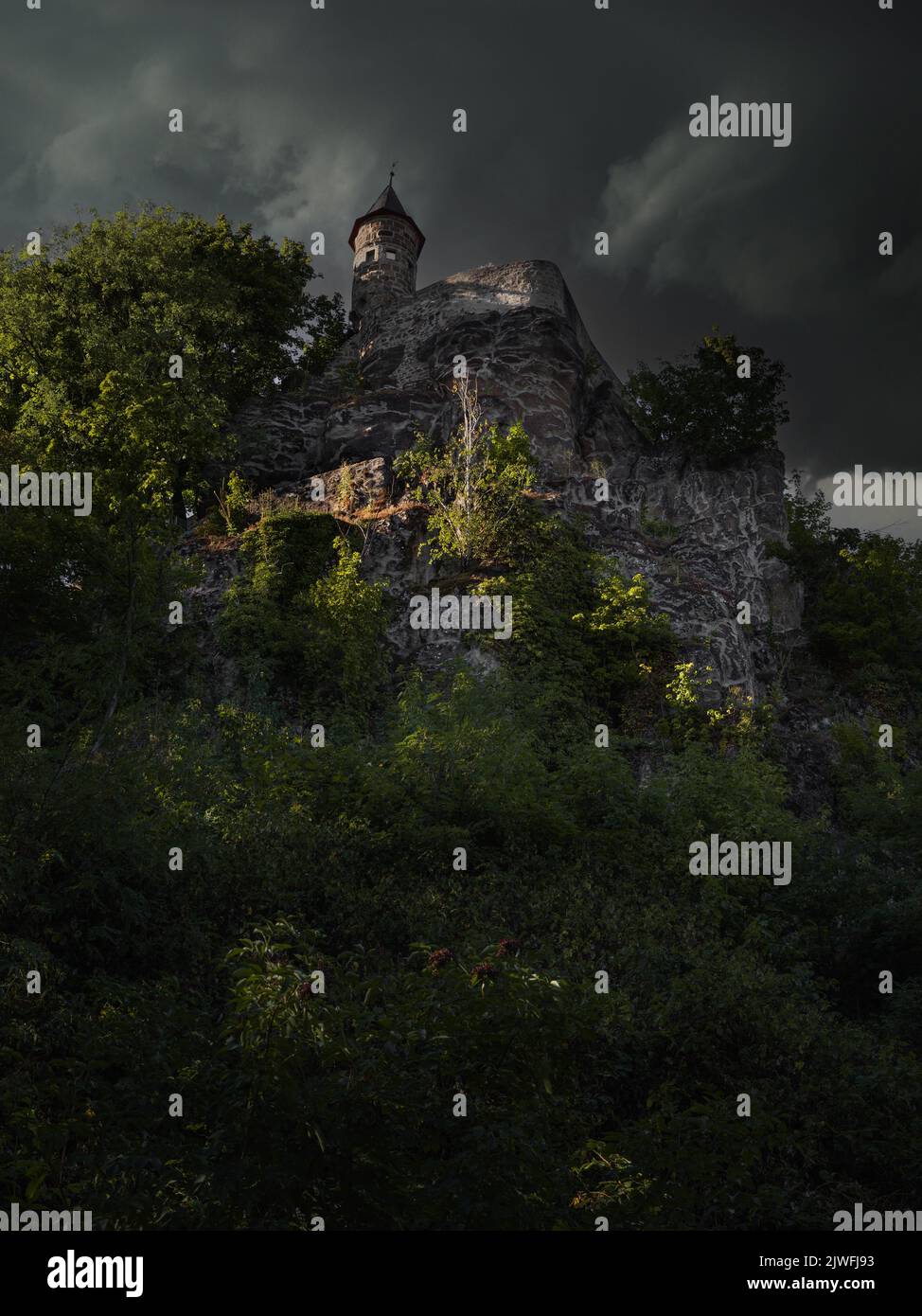 Mystical image of a corner tower of an old castle complex Stock Photo ...