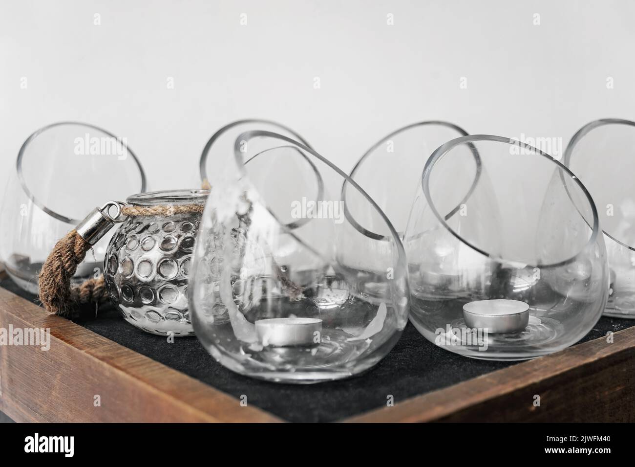 Set of glass candlesticks Stock Photo - Alamy