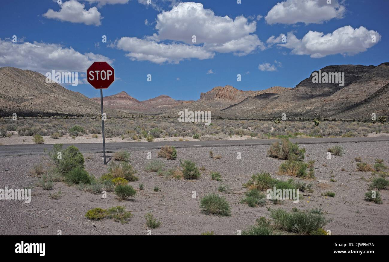 Stop sign in middle of nowhere on ET Highway NV-375 Stock Photo - Alamy