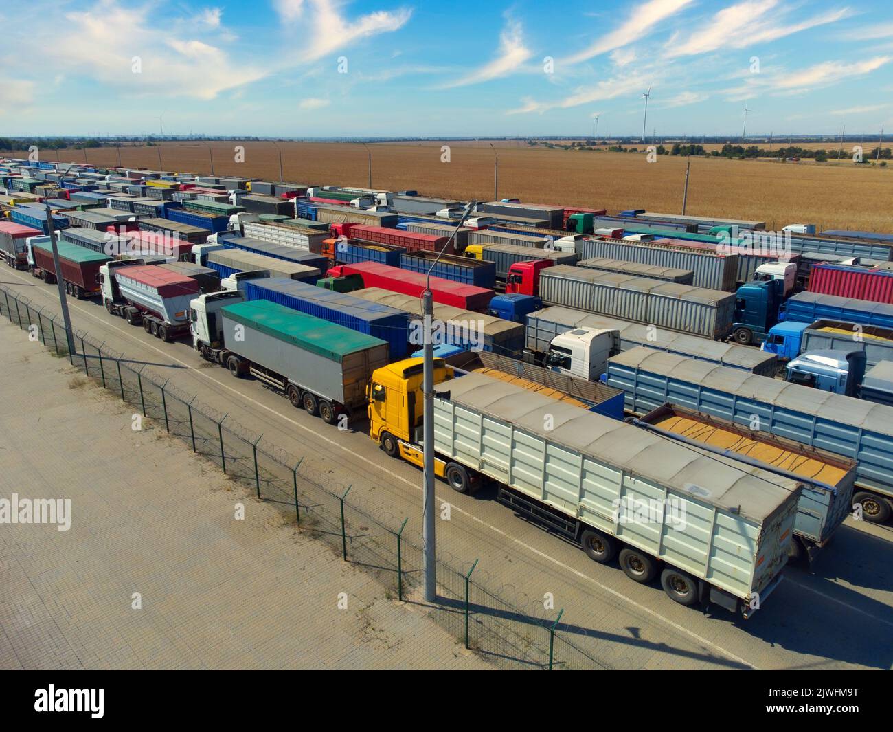 Aerial view of trucks. Terminal in the port for unloading trucks with ...