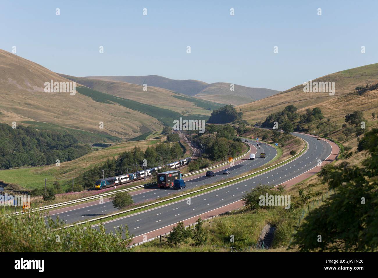 Avanti west coast Alstom pendolino train 390043 running alongside the ...