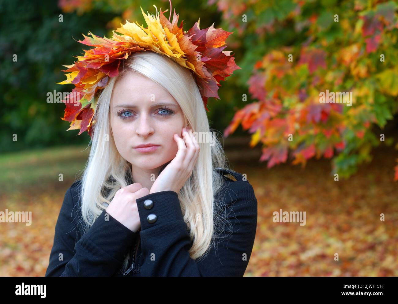 Beautiful fall colors and woman with leaves crown autumn season Stock ...