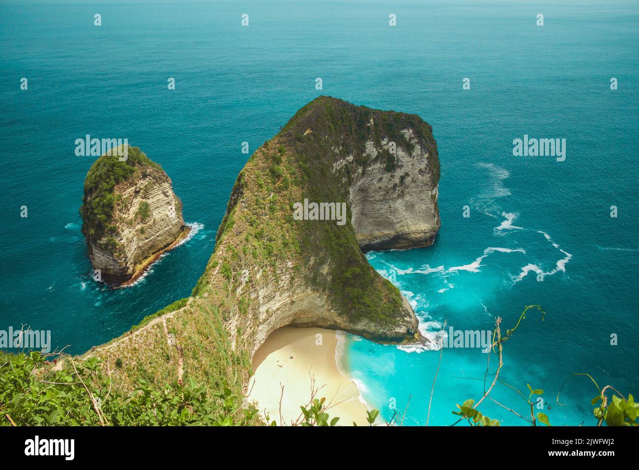 The Kelingking beach, Nusa Penida island near Bali, Indonesia. Cliff in the ocean. Tropical ...