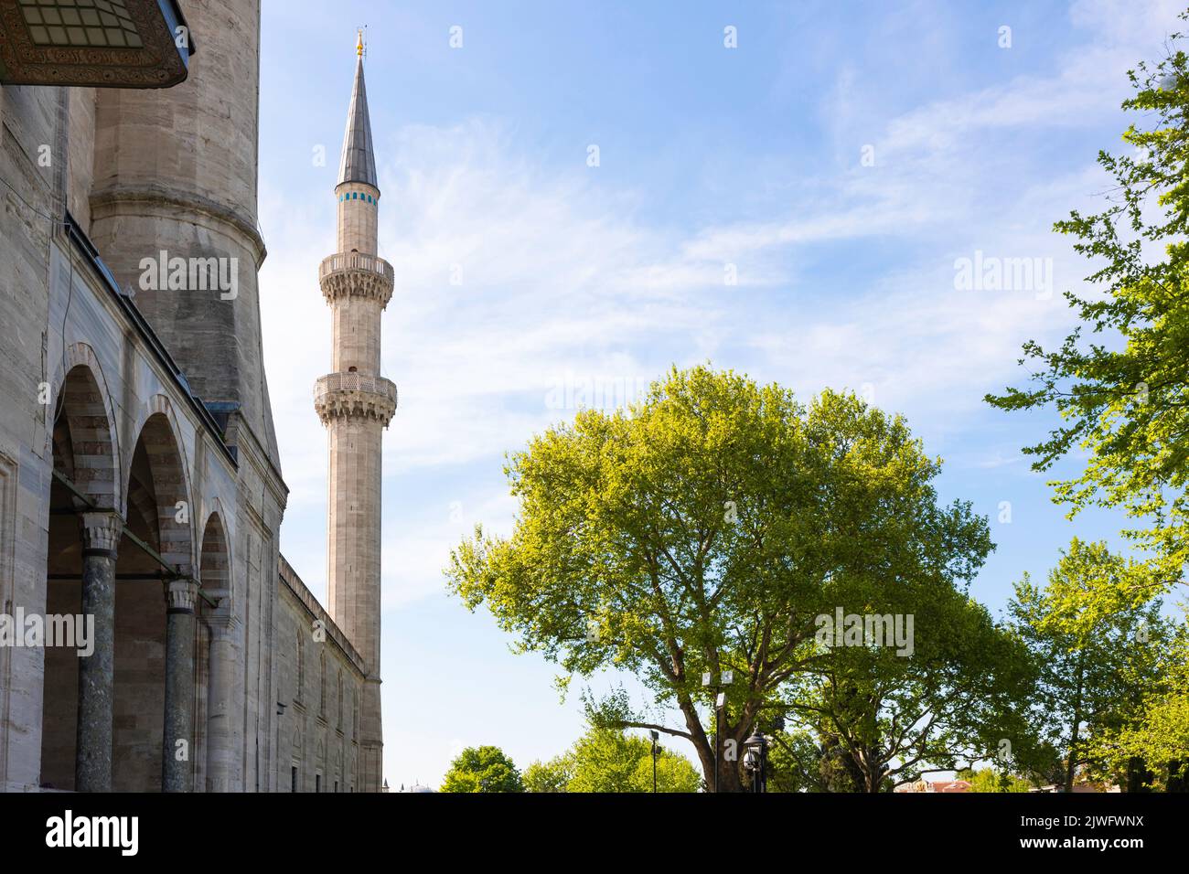 Islamic architecture background. Minaret of Suleymaniye Mosque and ...