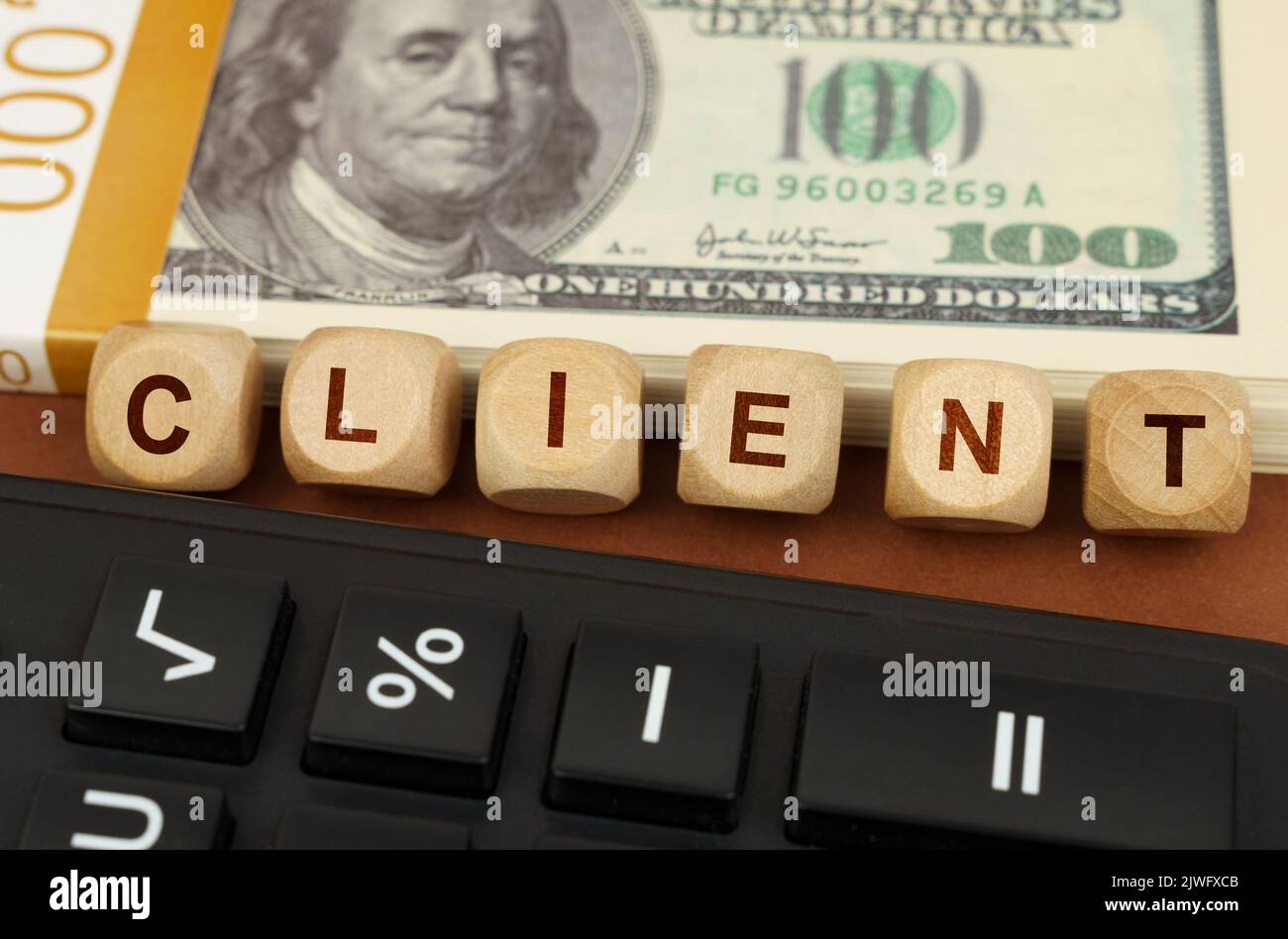 Business concept. Next to the calculator and dollars are cubes with the ...