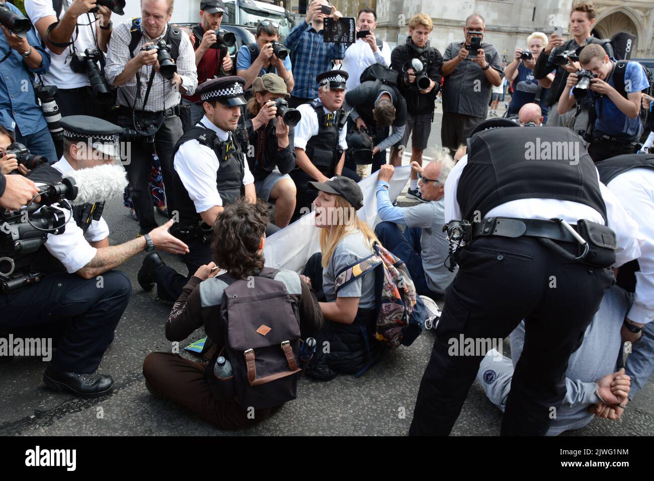 Climate protesters disrupt traffic outside Queen Elizabeth II Centre ...