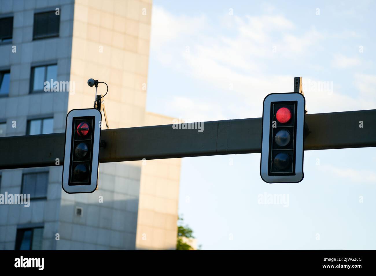 Two traffic lights on a metal display showing red Stock Photo - Alamy