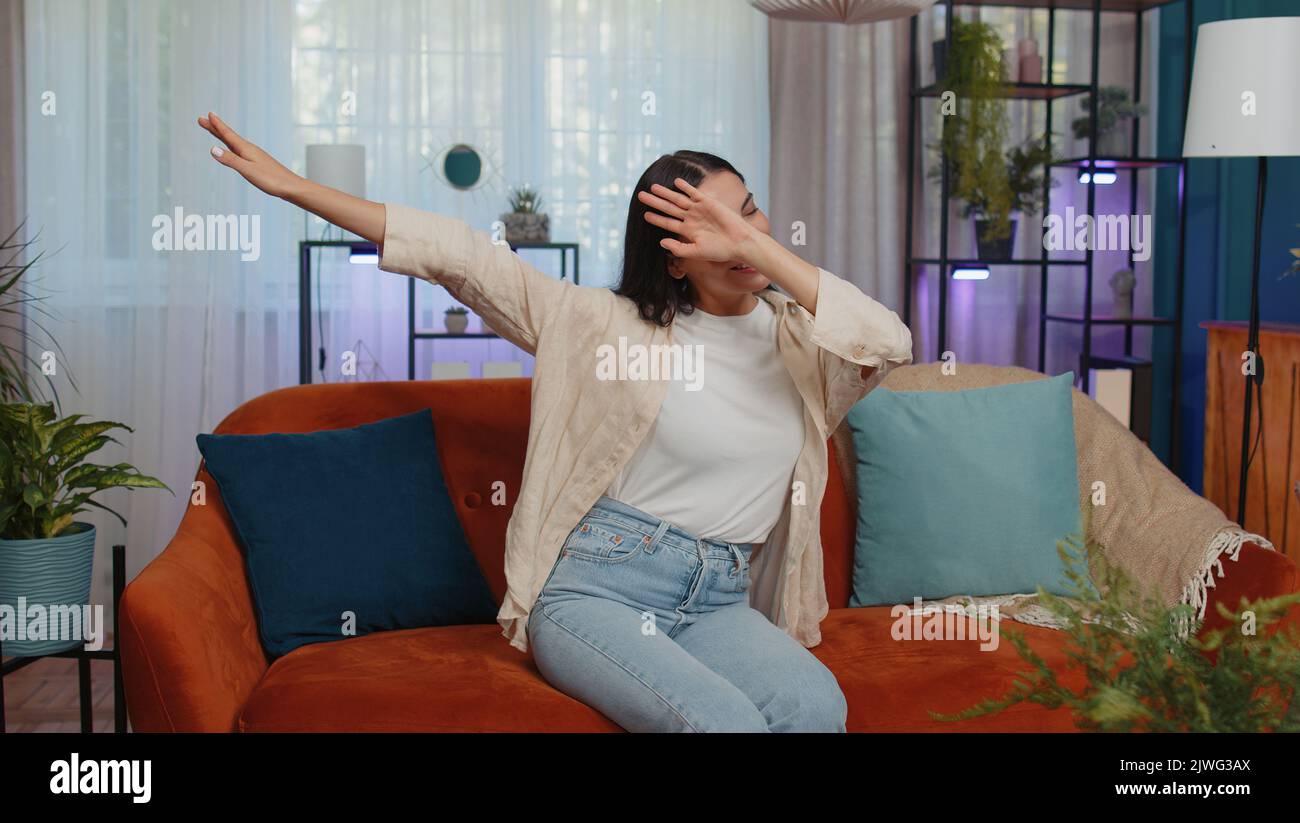 Trendy cheerful positive caucasian girl having fun dancing and moving ...