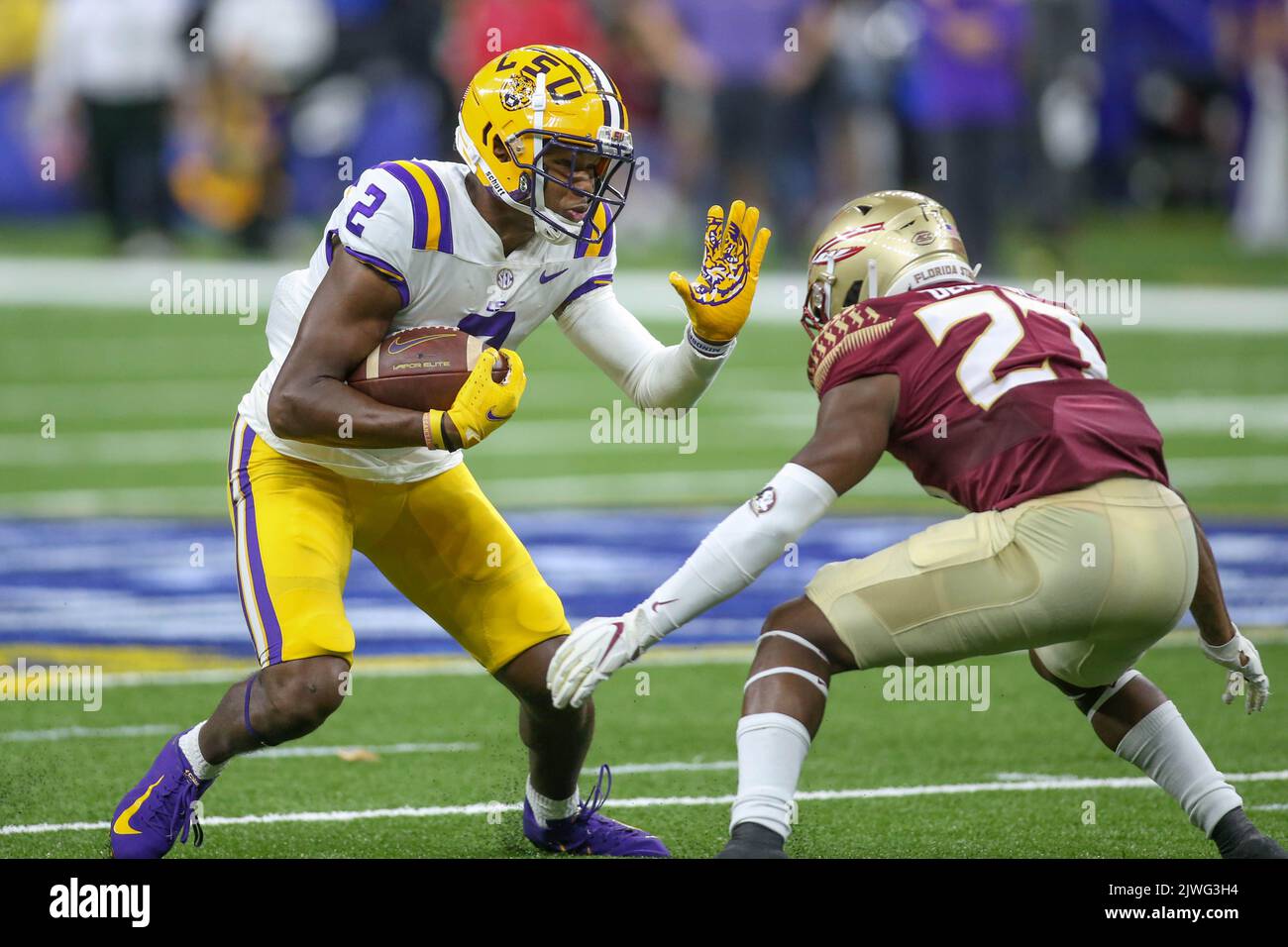 September 4, 2022: LSU's Kyren Lacey (2) looks to break a tackle by ...