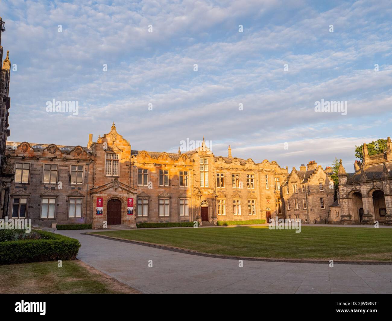 The exterior design of University of St. Andrews against cloudy sky in ...