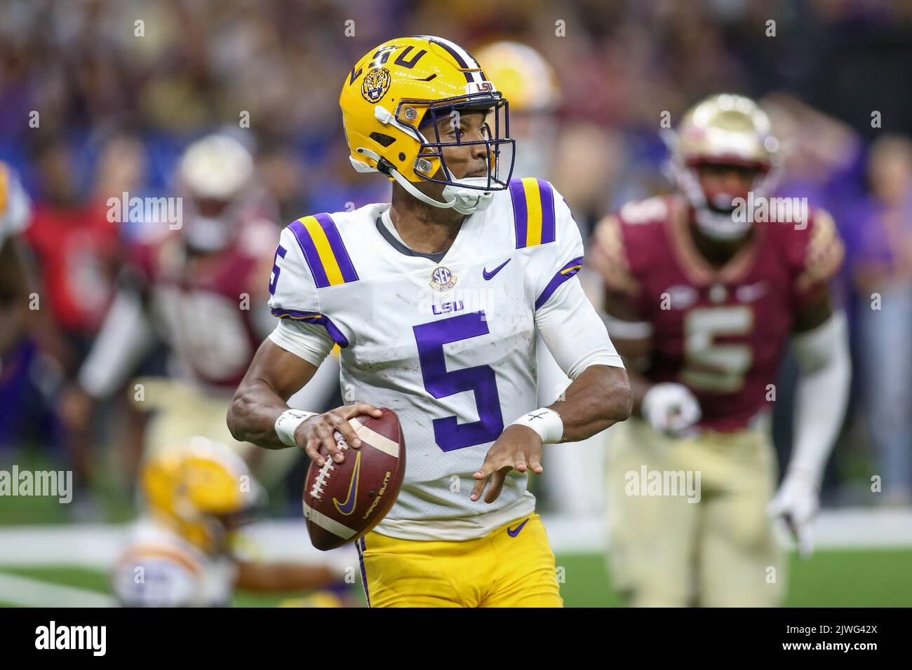 September 4, 2022: LSU quarterback Jayden Daniels (5) rolls out of the ...