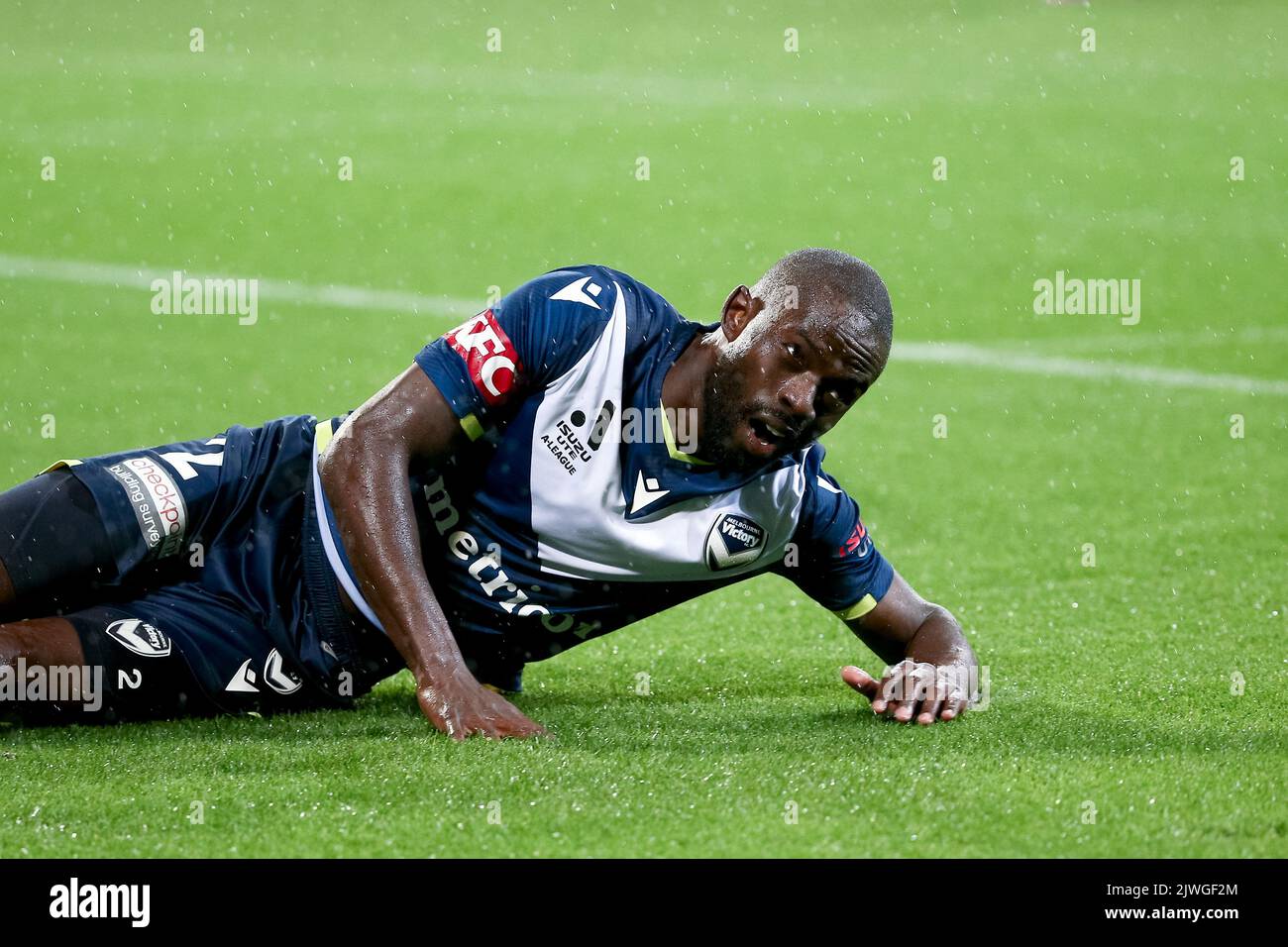 MELBOURNE, AUSTRALIA - APRIL 29: Jason Geria of Melbourne Victory falls ...