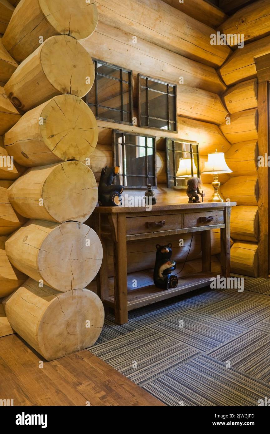 Rustic console table in main entrance hall inside a luxurious ...