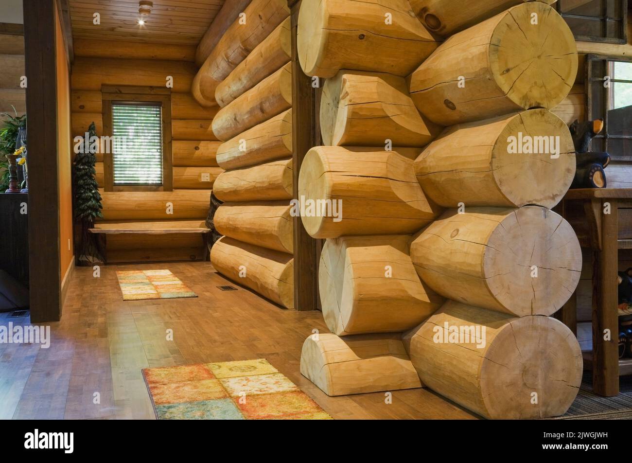 Hallway with colourful runners on the ground floor inside a luxurious ...
