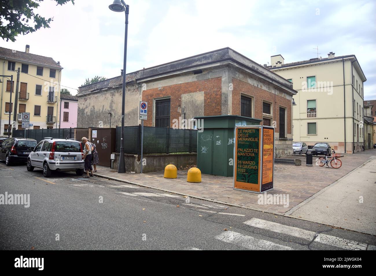Brick utility building in a square on a cloudy day Stock Photo - Alamy