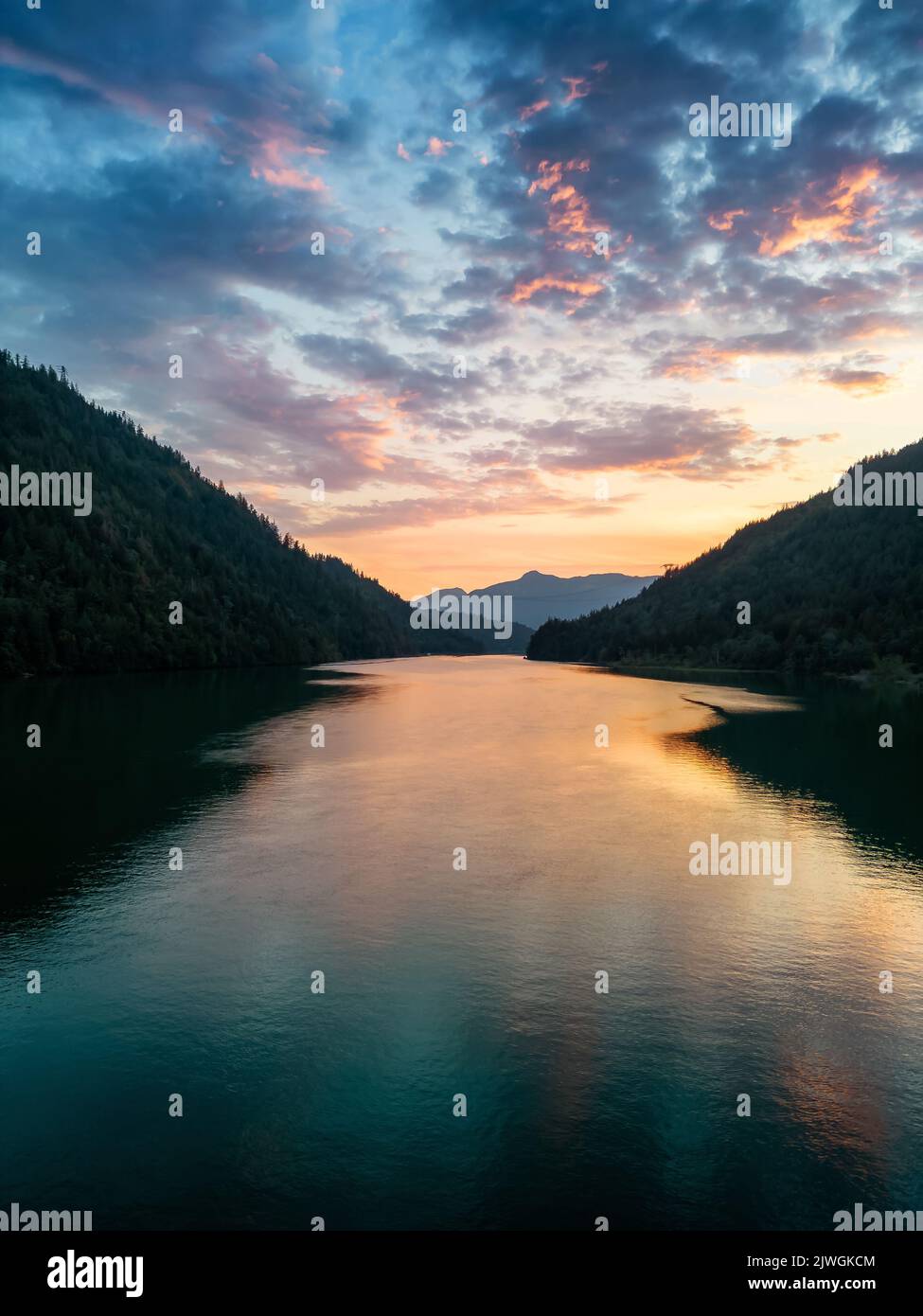 River and mountains in Canadian Nature during colorful Sunset. Harrison ...