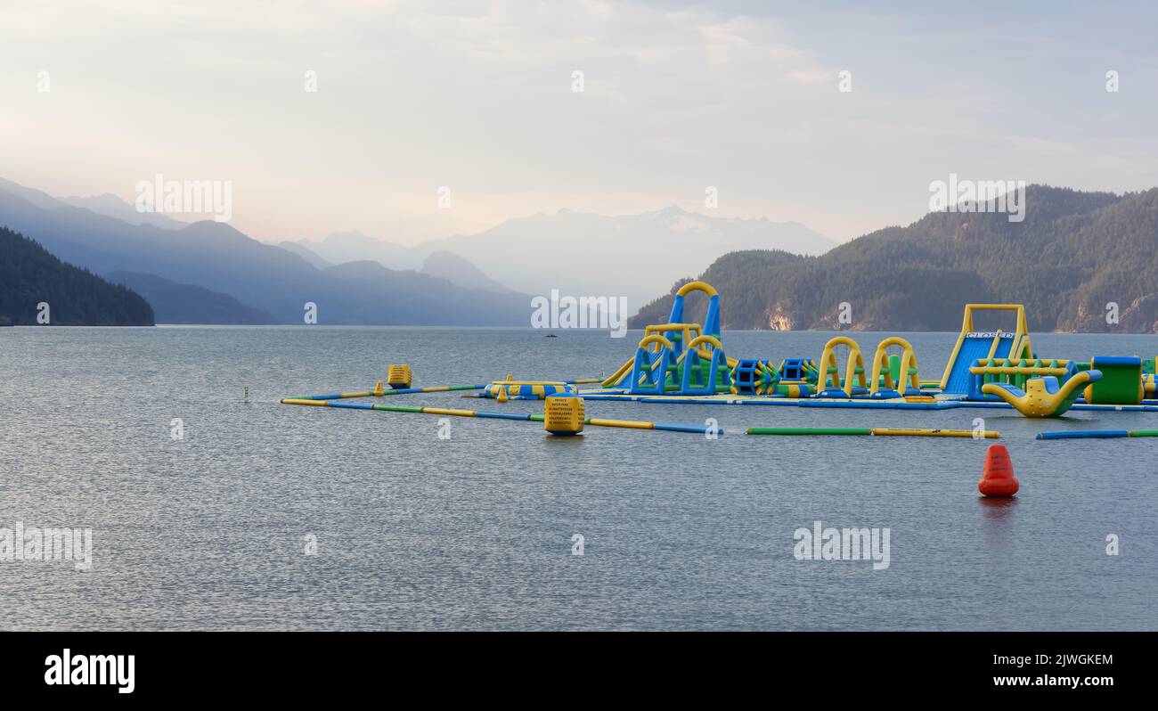 Water Park playground during a vibrant sunny summer sunset Stock Photo ...