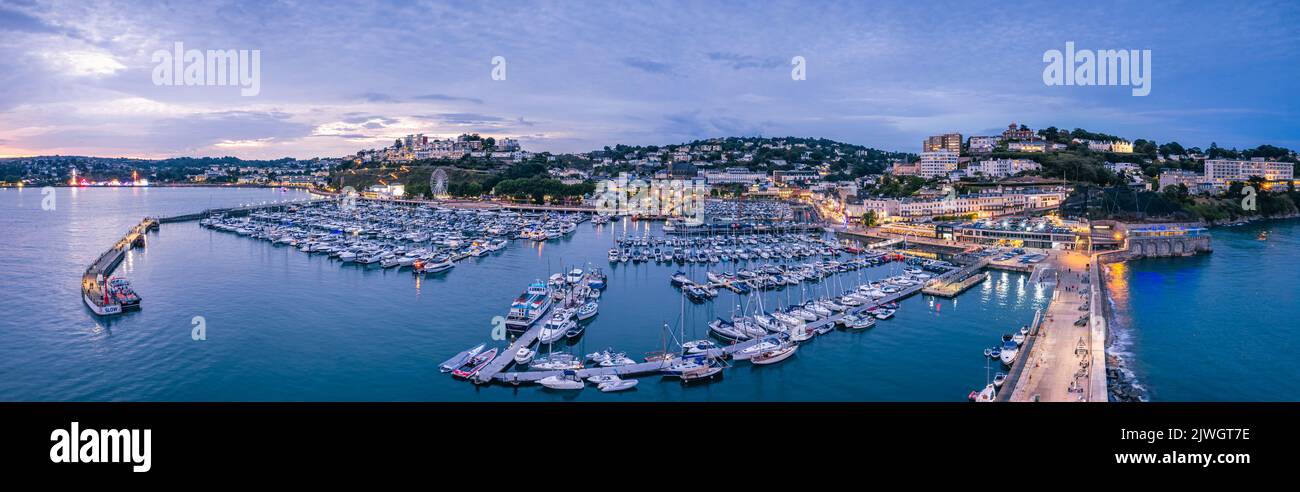 Sunset over Torquay Harbour and Marina, English Riviera from a drone ...