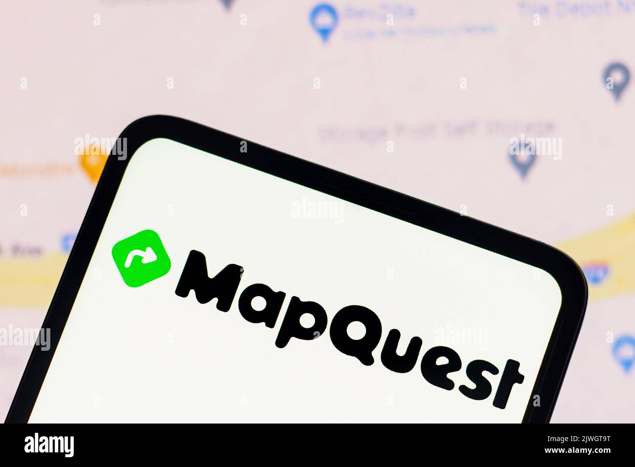 In this photo illustration, the MapQuest logo is displayed on a ...