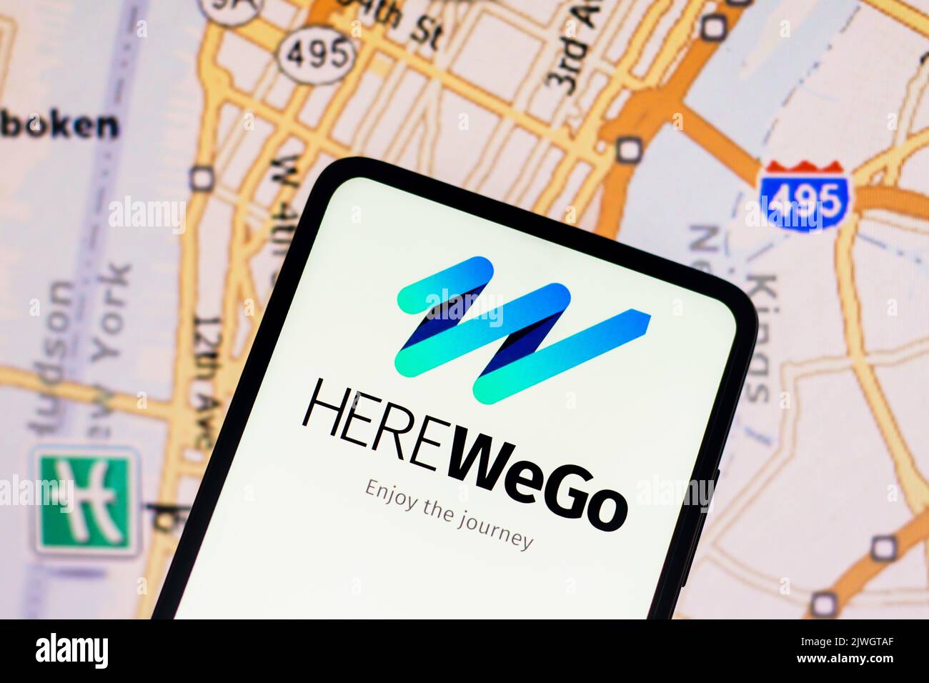 In this photo illustration, the Here WeGo logo is displayed on a smartphone screen Stock Photo ...