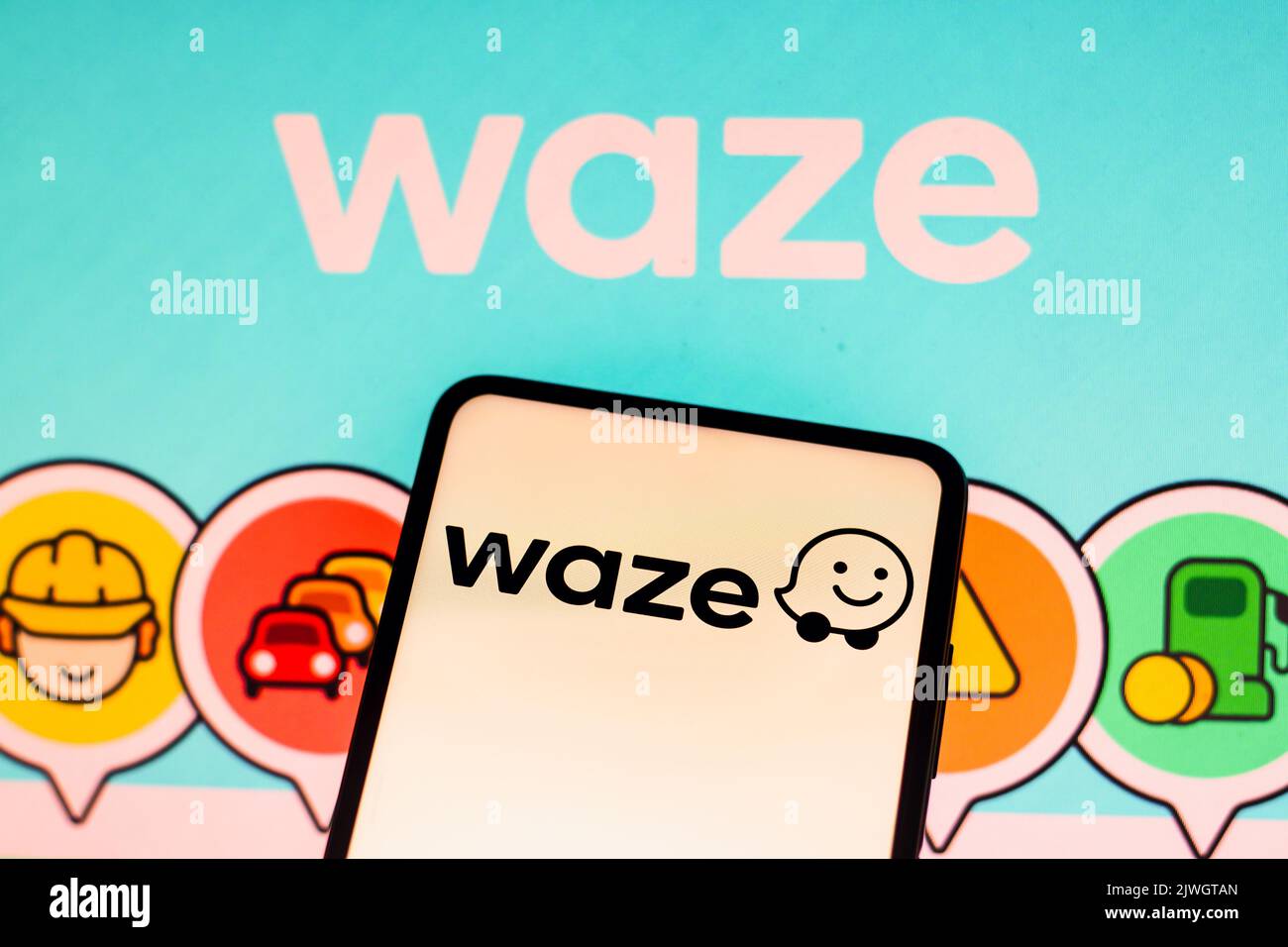 In this photo illustration, the Waze logo is displayed on a smartphone ...