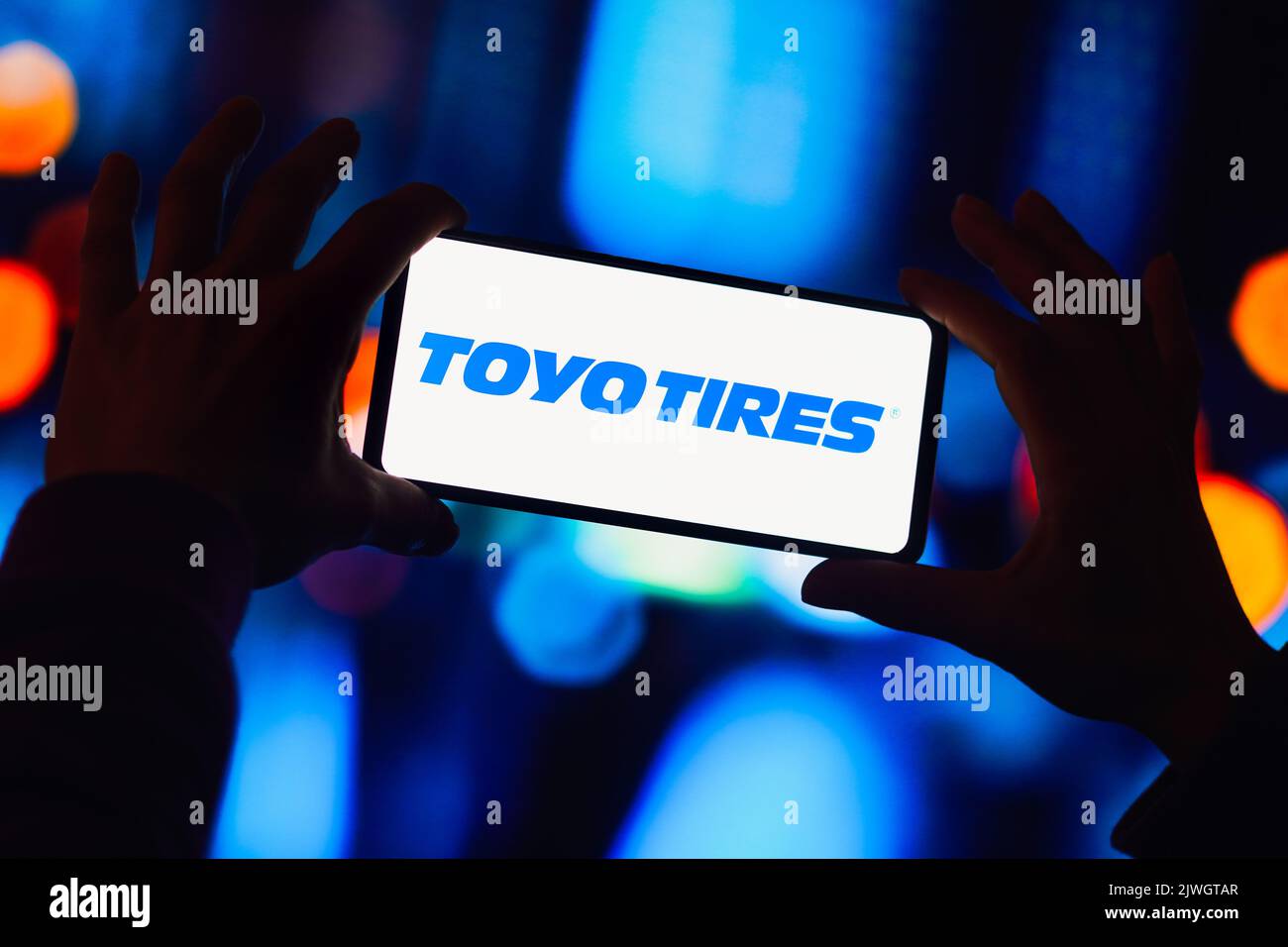 In this photo illustration, the Toyo Tires and Rubber Company logo is ...