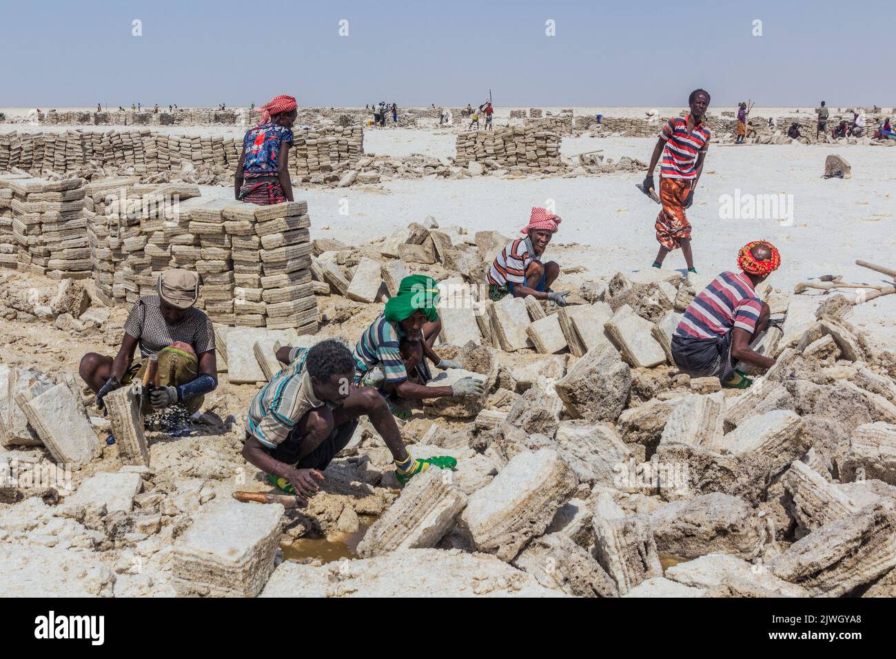 DANAKIL, ETHIOPIA - MARCH 24, 2019: Afar tribe salt miners in the ... DANAKIL, ETHIOPIA - MARCH 24, 2019: Afar tribe salt miners in the ...