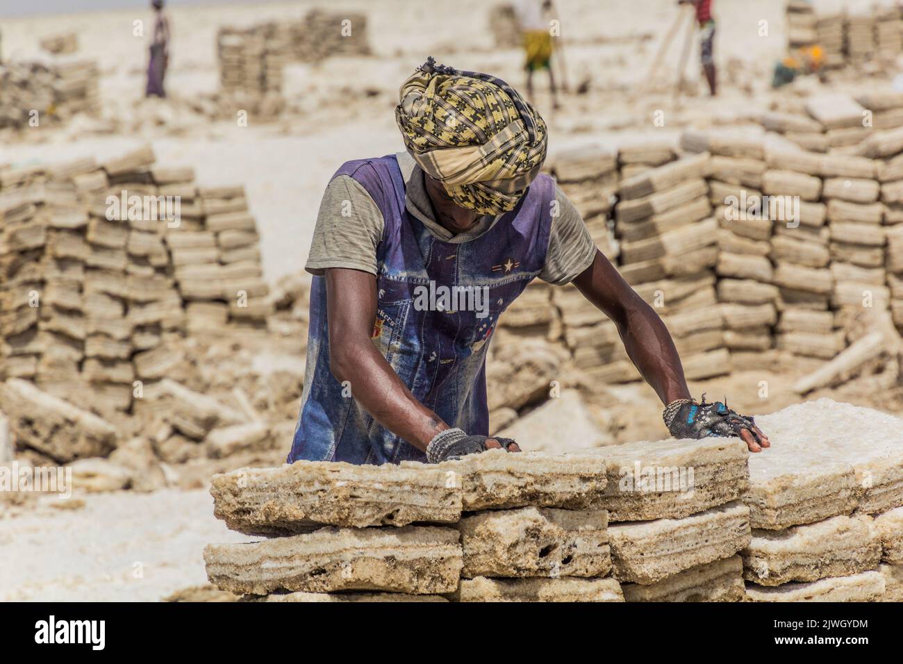 DANAKIL, ETHIOPIA - MARCH 24, 2019: Afar tribe salt miner in the ...