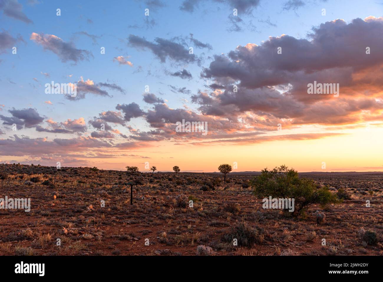 Sunset in the Outback as seen from Silverton Road in New South Wales ...