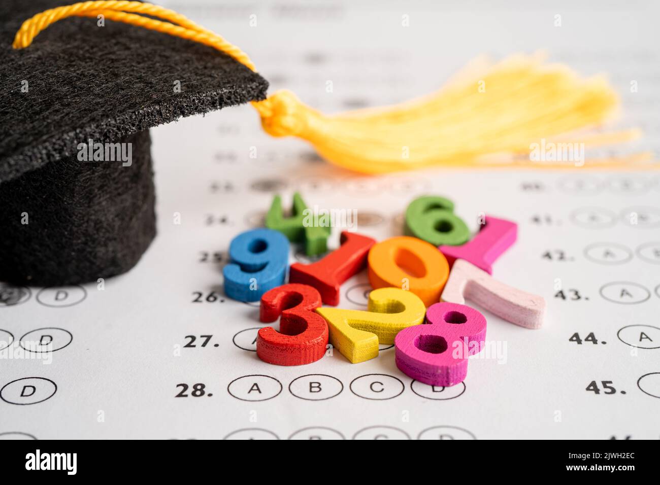 Math Number colorful with graduation hat and pencil on Answer sheet ...