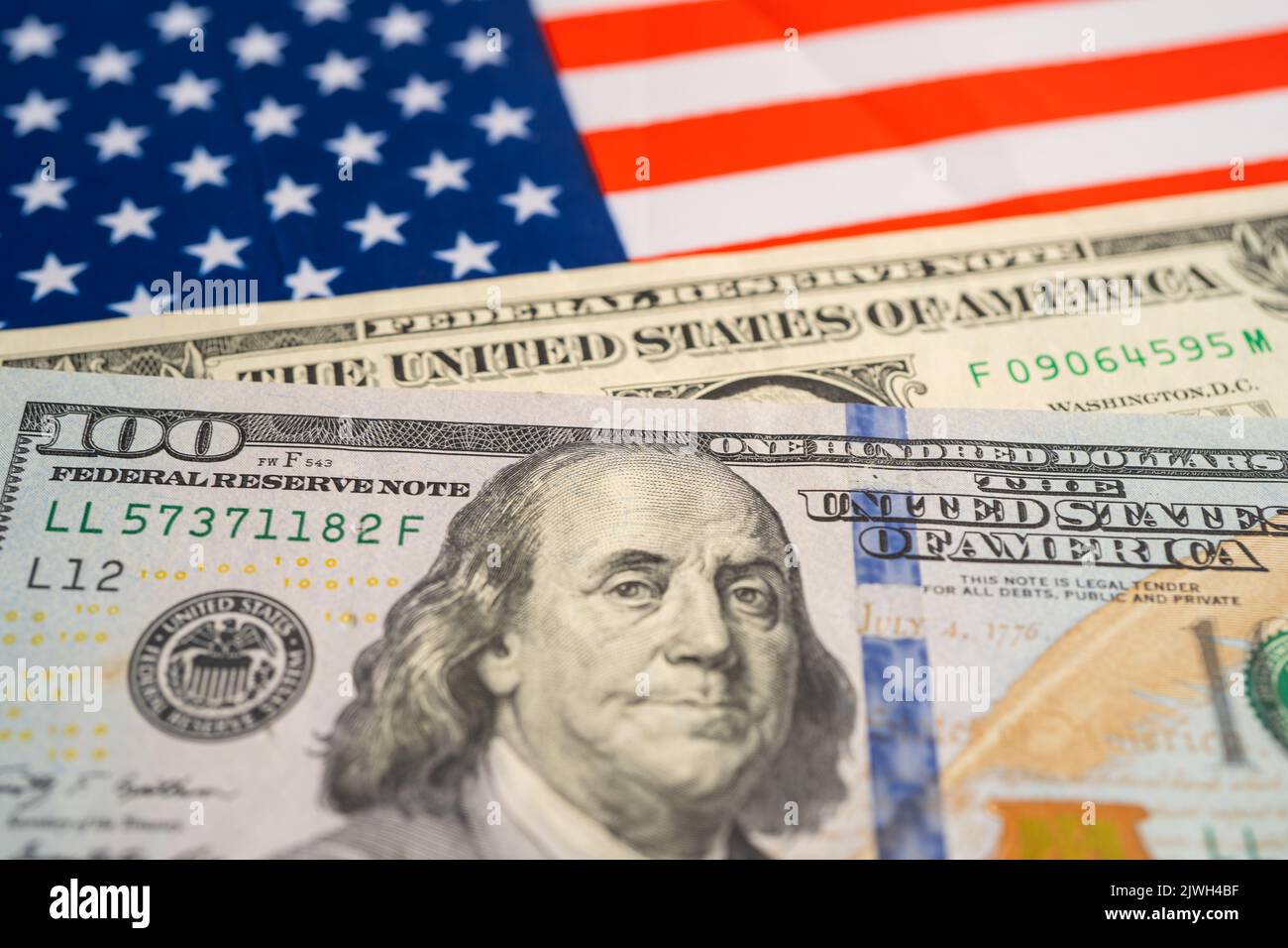 US dollar banknotes money on USA America flag, finance banking concept ...